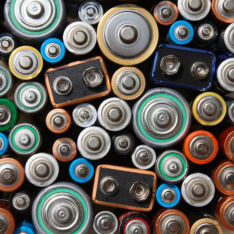 Top View of Four Different Types of Batteries in Varying Colors Stock ...