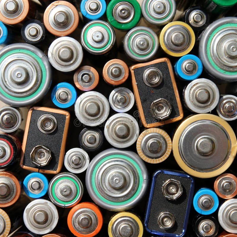 Top View of Four Different Types of Batteries in Varying Colors Stock ...