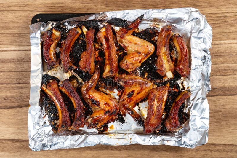 Top View Fresh Baked Chicken Wing and Pork Ribs Horizontal Composition ...
