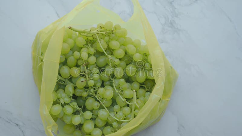 Top View of Fresh Grape Fruits in a Plastic Packet on Table Stock Video ...