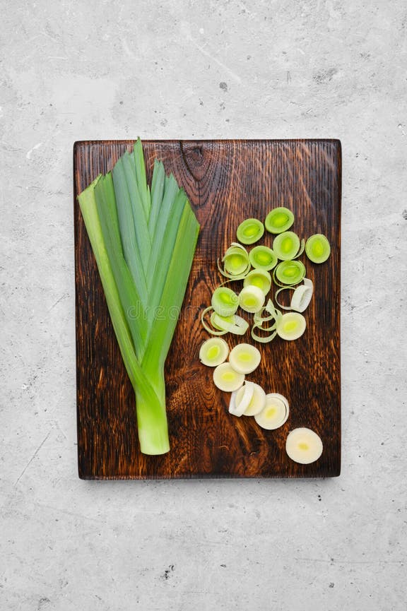 Top View of Fresh Leeks on Cutting Board Stock Photo - Image of leek ...