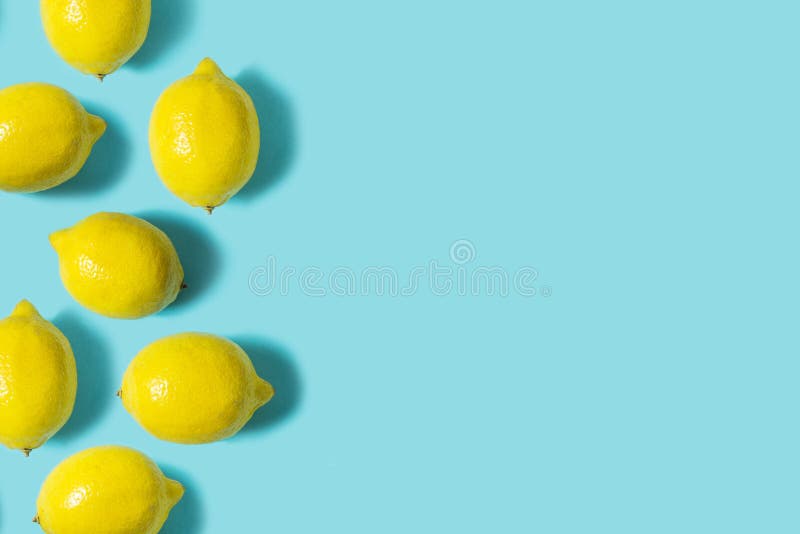 Top View of Fresh Lemon Isolated on Blue Background. Fruit Minimal ...