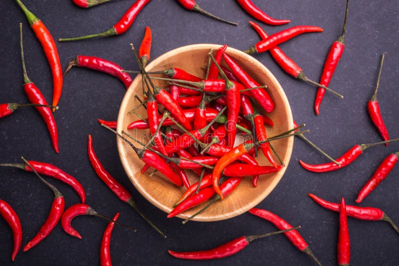 Top View Fresh Red Hot Chilli on Black Stone Board Stock Image - Image ...