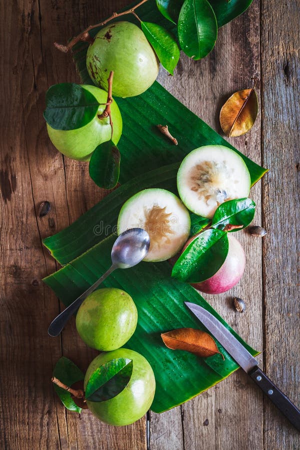 Top View of Fresh Ripe Star Apples on a Wooden Table and Board Stock ...
