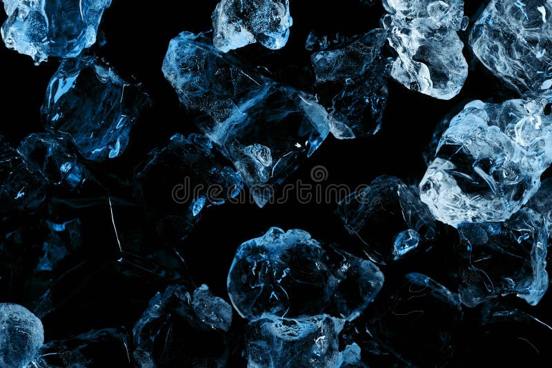 Top View of Frozen Ice Cubes with Blue Light Isolated on Black. Stock ...