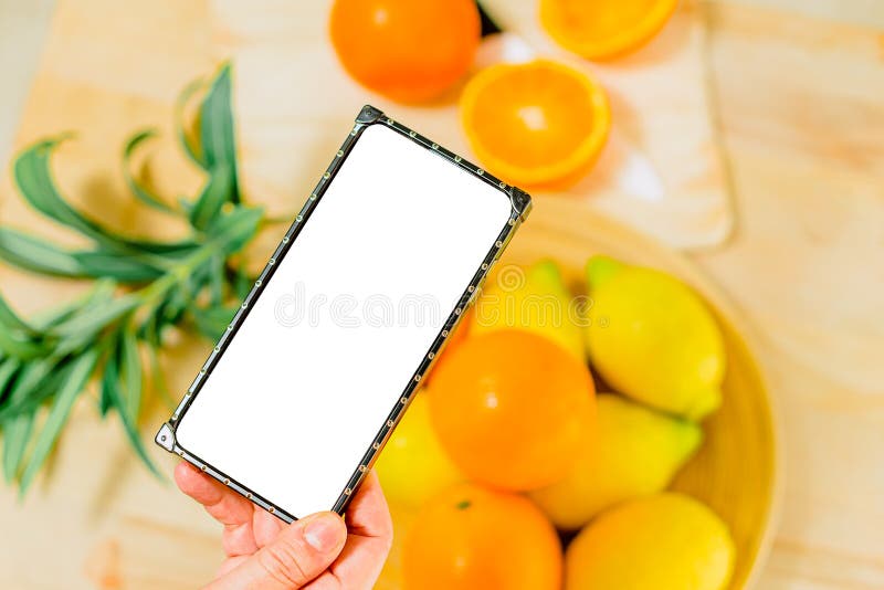 Top View of Fruit Pieces with a Mobile Phone with a Blank Screen Stock ...