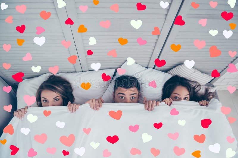 Top View of Funny Three Partners Hiding Behind Blanket, Peeking Over ...