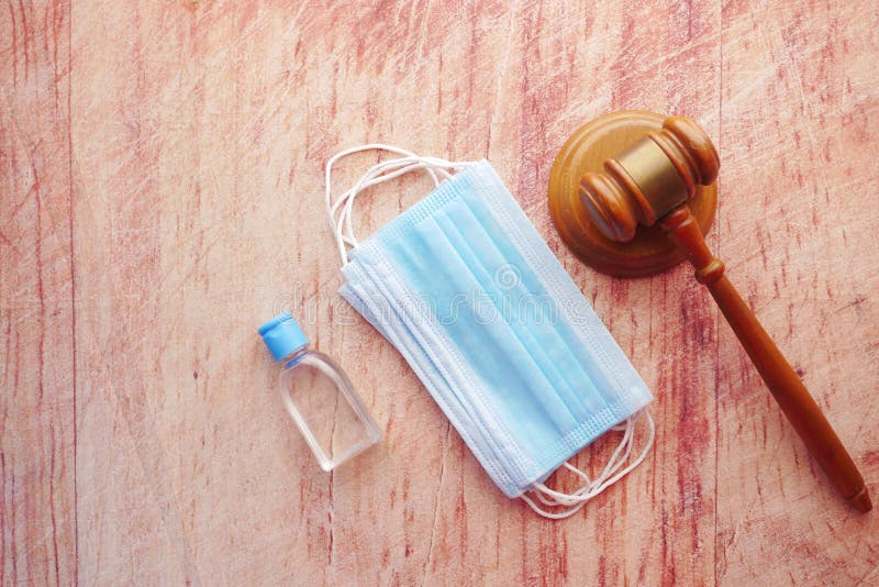 Top View of Gavel and Surgical Face Mask on Table Stock Image - Image ...