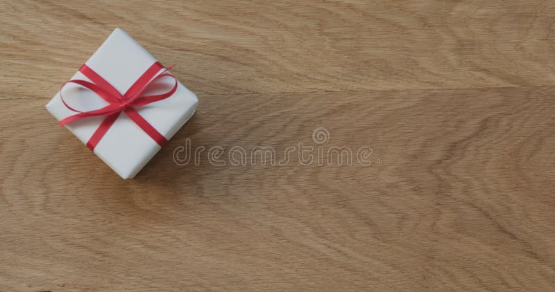 Top View Gift Box with Red Ribbon on Oak Table Stock Image - Image of ...