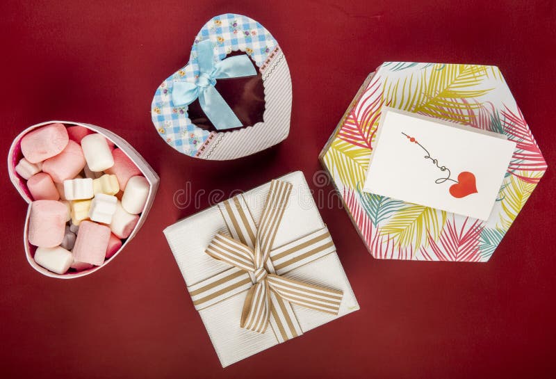 Top View of Gift Boxes of Different Shapes and Colors and Marshmallow ...