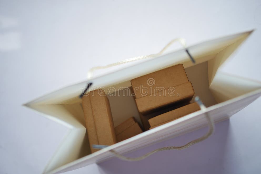 Top View of Gift in a Packet Stock Photo - Image of white, hand: 273269332