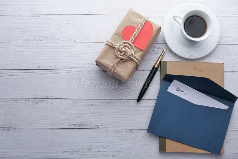 Top View of Gift, Tea and Envelope on Table Stock Image - Image of ...