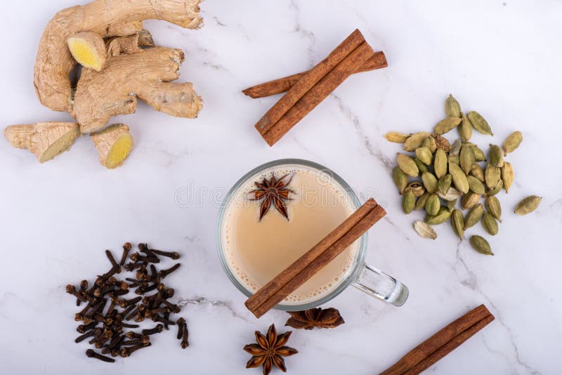 Top View of a Glass Cup with Masala Chai and Spices for Making Tea ...