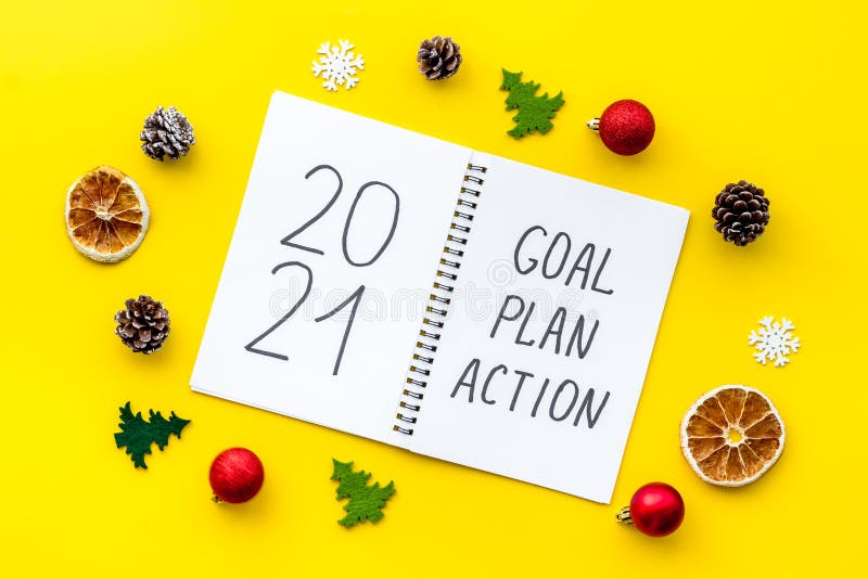 Top View of 2021 Goals List with Decorations and Notebook on a Table ...