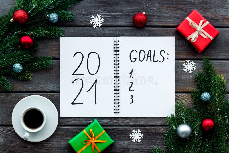 Top View of 2021 Goals List with Decorations and Notebook on a Table ...