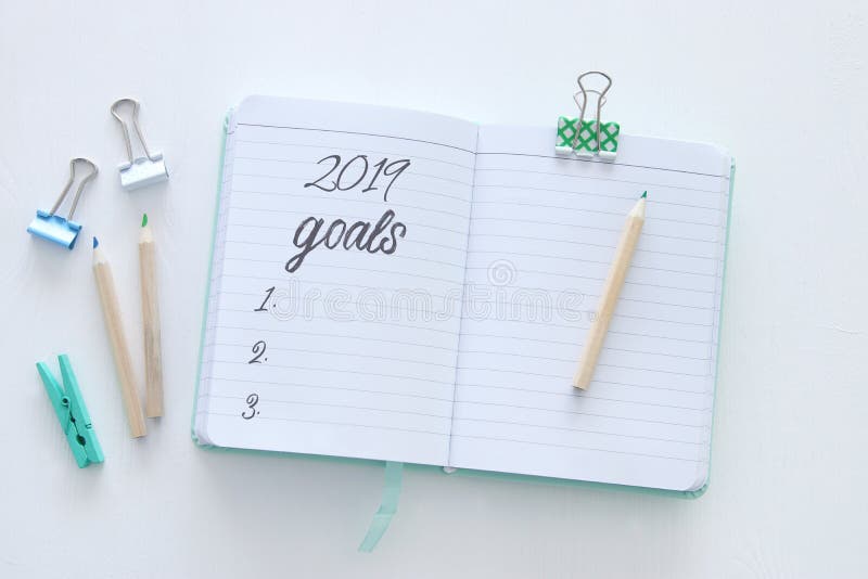 Top View 2019 Goals List with Notebook Over White Wooden Desk. Stock ...