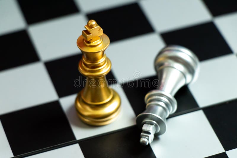 Top View of Gold King Chess Piece Win Over Lying Down King on Chess ...