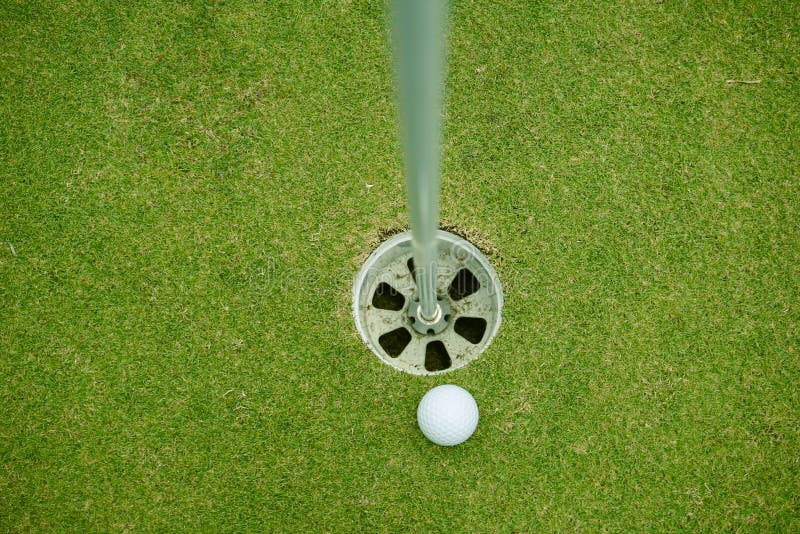 Top View of a Golf Ball on Green Course at Hole Stock Image - Image of ...