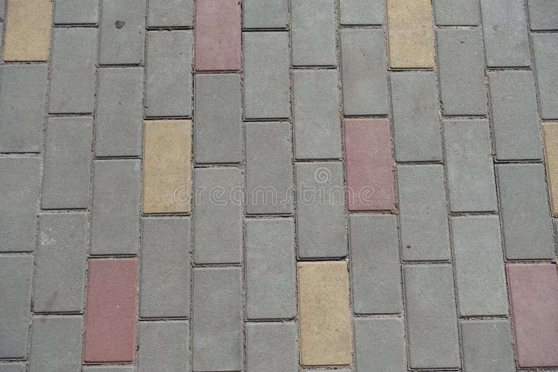 Top View of Gray, Pink and Yellow Pavement with Stretcher Bond Pattern ...