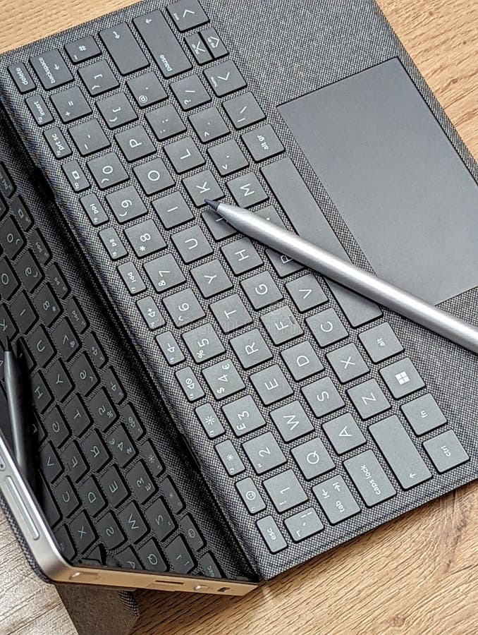 Top View of Gray Stylus on the Keyboard of Notebook and Its Reflection ...