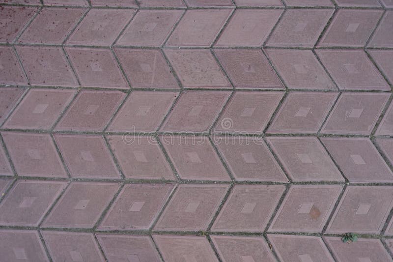 Top View of Grayish Pink Diamond-shaped Concrete Pavement with ...