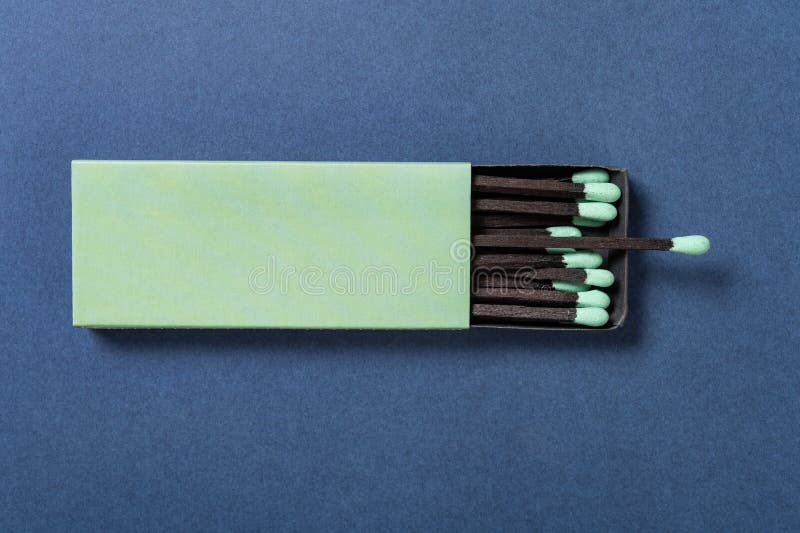 Green Matchbox on a Blue Background at Horizontal Composition Stock ...