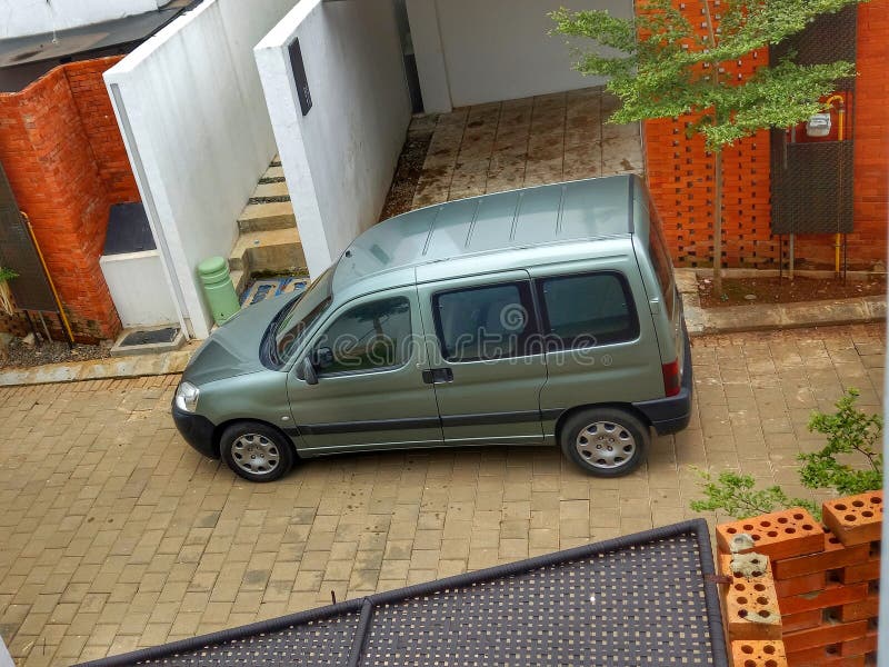 Top view of green minivan stock photo. Image of view - 211791814