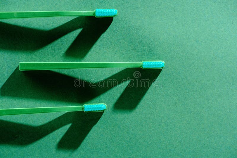 Green Toothbrushes, on Green Stock Image - Image of fresh, dental ...