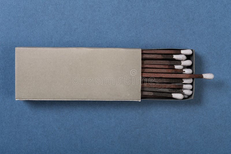 Top View Grey Color Matchbox and Grey Match Sticks on Blue Background ...