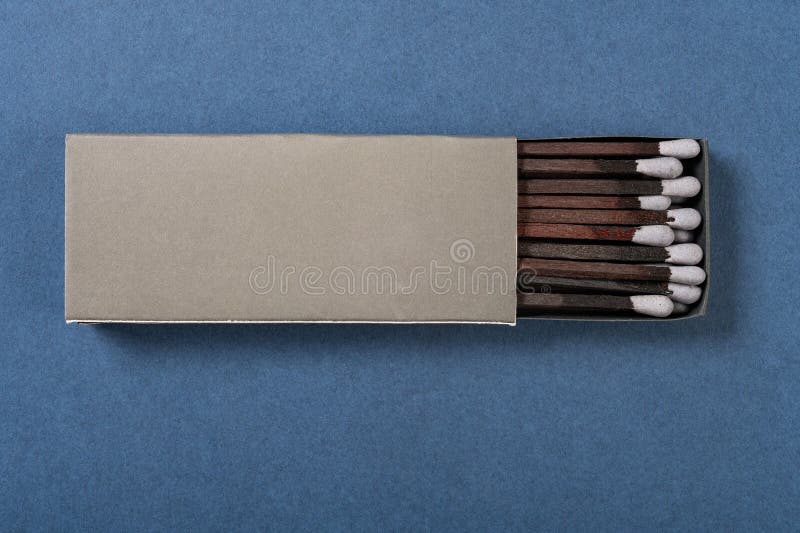 Top View Grey Color Matchbox and Grey Match Sticks on Blue Background ...