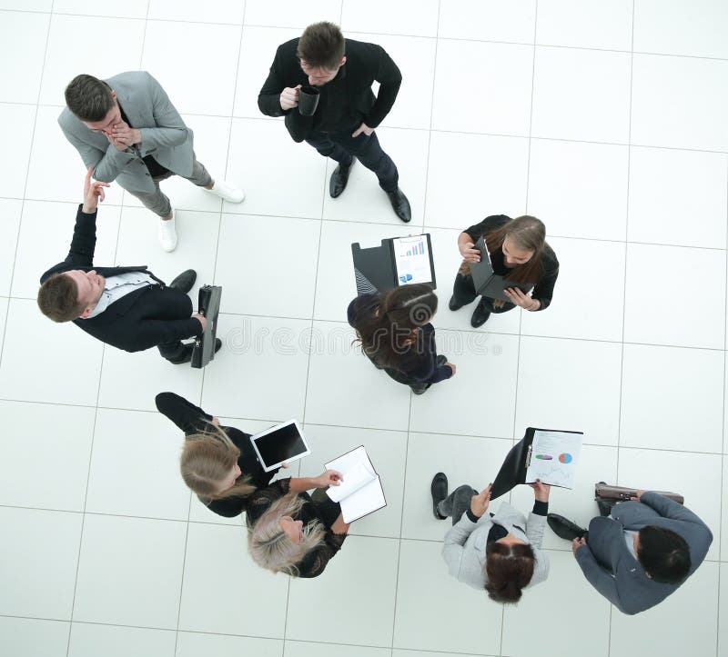 Top View. Group of Business People Standing in the Office Stock Photo ... Top View. Group of Business People Standing in the Office Stock Photo ...
