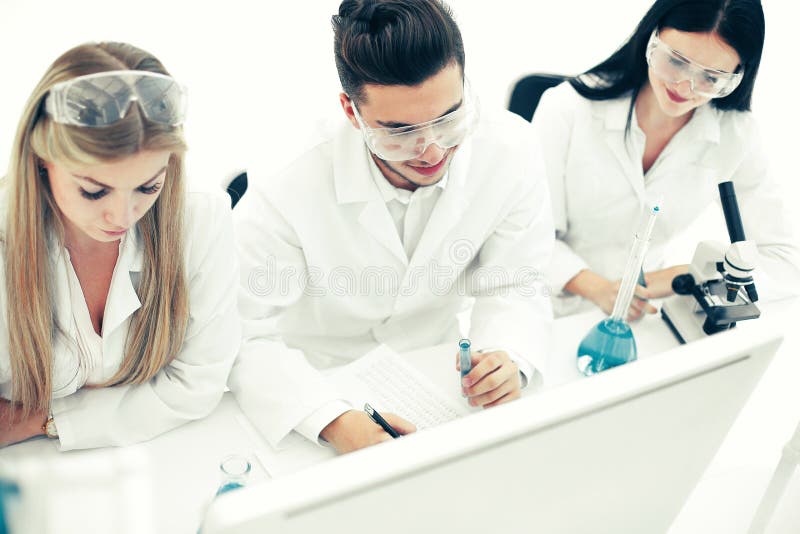 Top View.a Group of Scientists Working on a Computer in the Labo Stock ... Top View.a Group of Scientists Working on a Computer in the Labo Stock ...