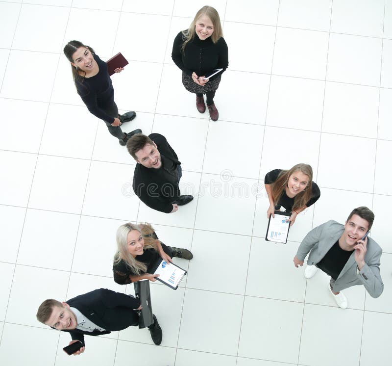 Top View. Group of Serious Diverse Business People Looking at the ...