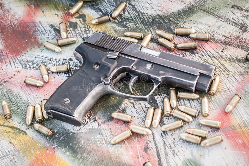 Top View of Gun and Ammunition on the Table Stock Image - Image of ...