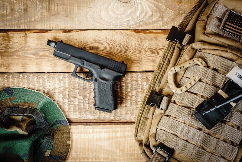 Top View of the Gun, Backpack and Hat Stock Image - Image of crime ...