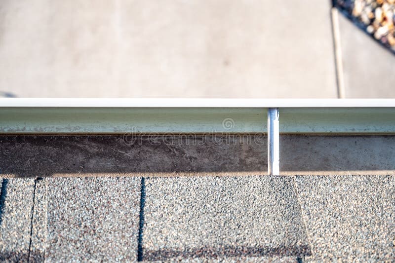 Top View of a Gutter System on a Residential House. Asphalt Shingles ...