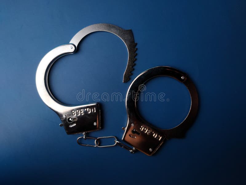 Top View Hand Cuff on a Blue Background Stock Image - Image of adult ...