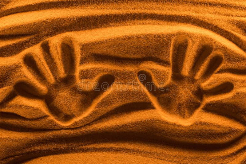 Top View of Hand Marks on Sand with Color Filter and Smooth Waves ...
