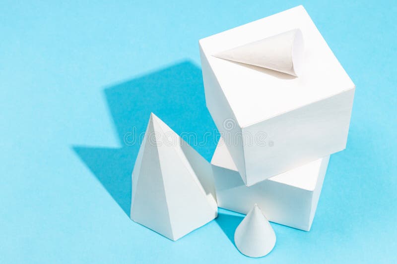 Top View of Handmade Geometric Solids on Blue Stock Photo - Image of ...