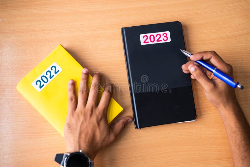 Top View of Hands Replacing 2022 Old Diary with New Year 2023 Dairy on ...
