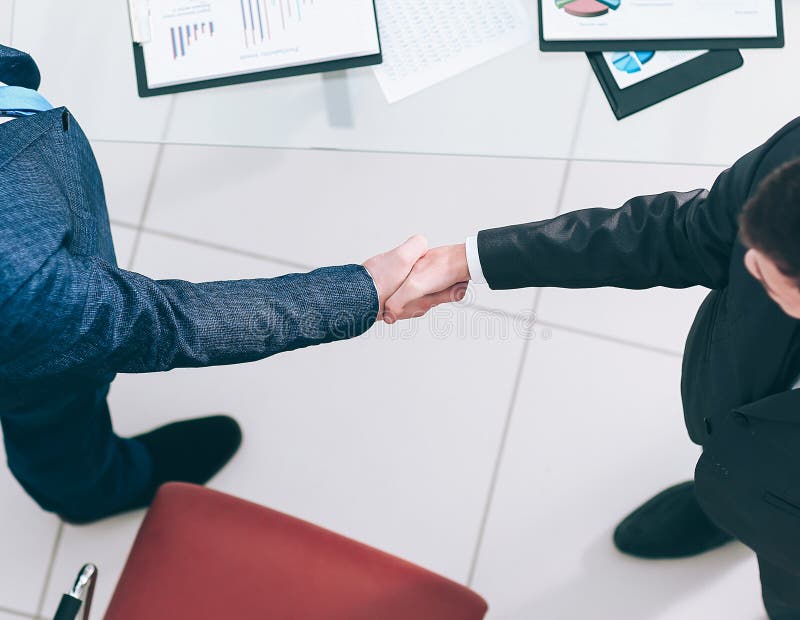Top View Handshake in after Successful Business Meeting. Fervent Stock ...