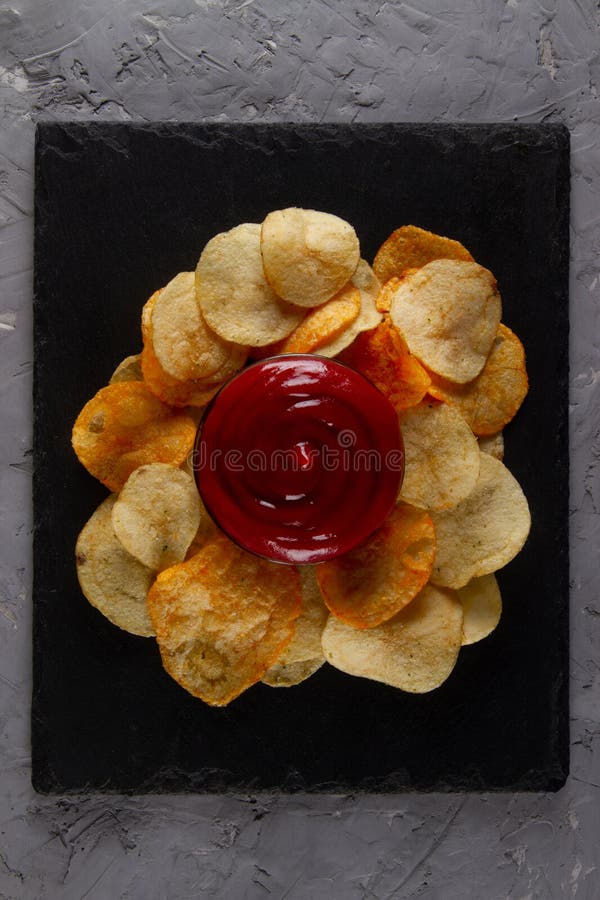 Potato Chips with Red Sauce Stock Photo - Image of sliced, crisps ...