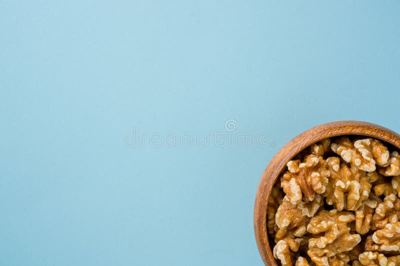 Walnut Kernels in a Bowl on a Rustic Table Stock Image - Image of ...