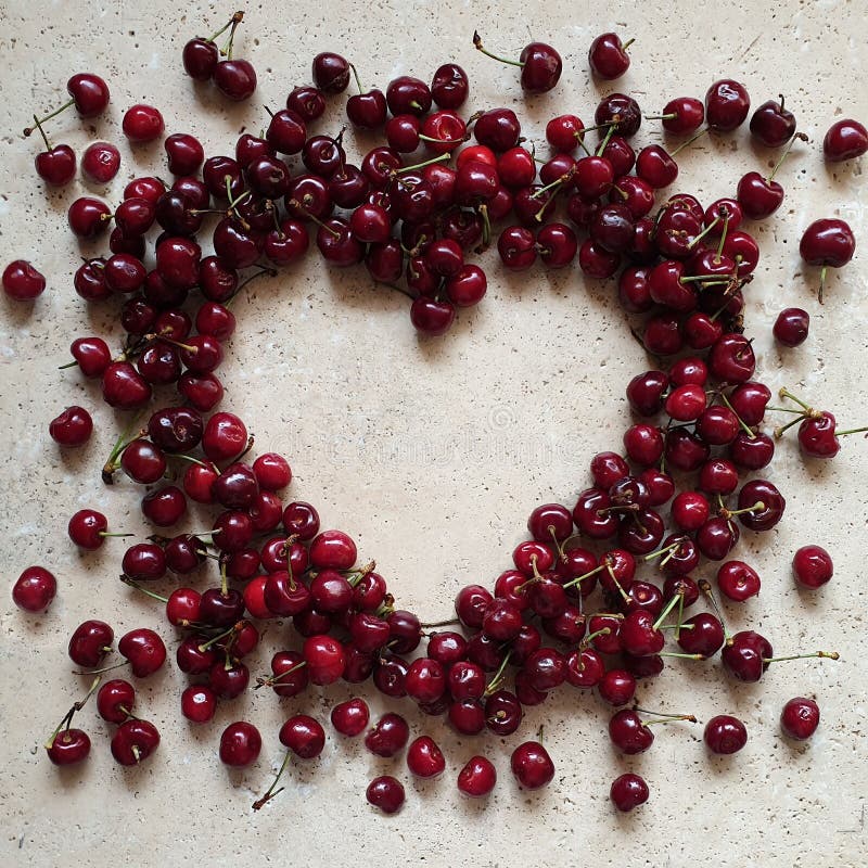 Top View of a Heart Shape Made with Cherries on a Stone Table with ...