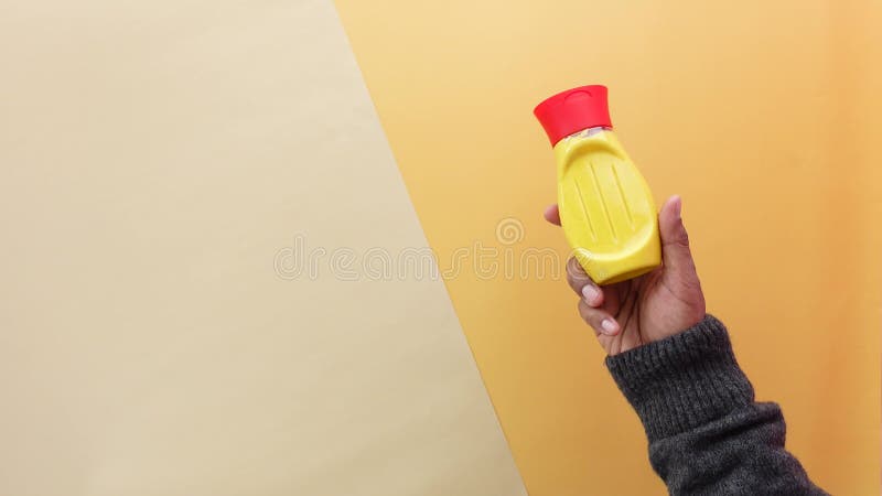 Top View of Holding a Mustard Mayonnaise Container Stock Footage ...