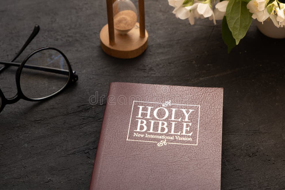 Top View of the Holy Bible on the Desktop with Hourglass. the Concept ...