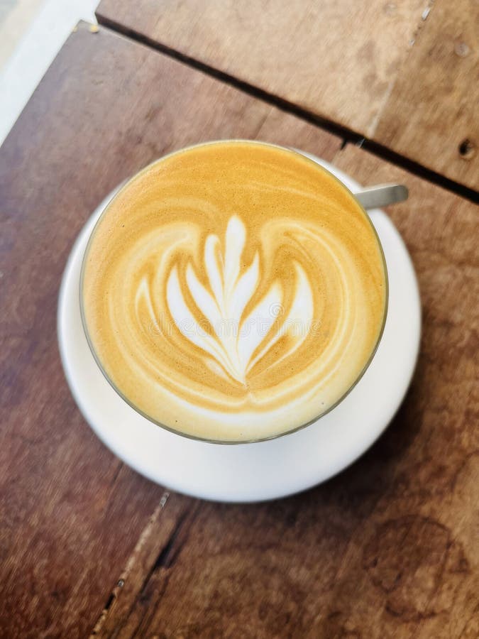Top View of Hot Latte Coffee with Latte Art in Ceramic White Cup on ...