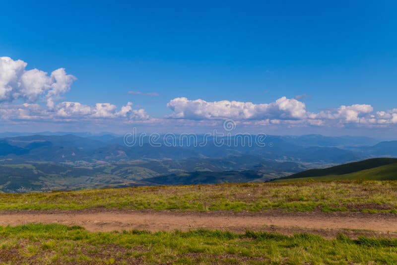 The Top View of the Huge Gently Sloping Green Mountain Ranges and the ...