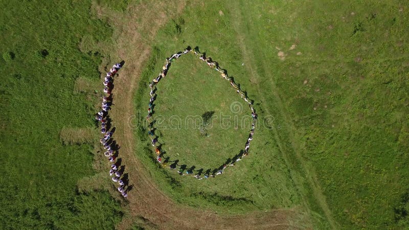 Top View of the Huge Ring of People Dance Around a Tree. Stock Footage ...