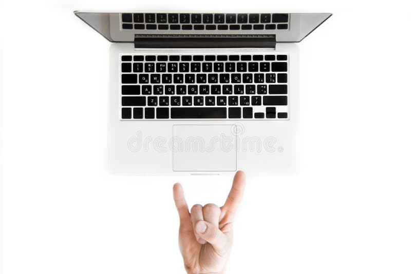 Top View of Human Hand with Rock Sign and Laptop Computer Isolated on ...